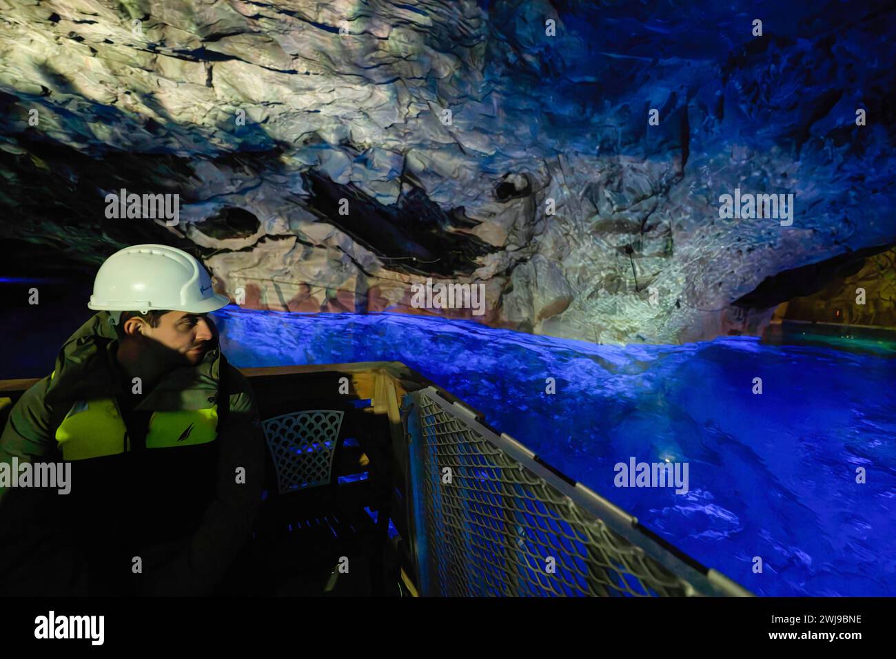 A group of visitors tours some galleries of the Bergtatt marble mine ...