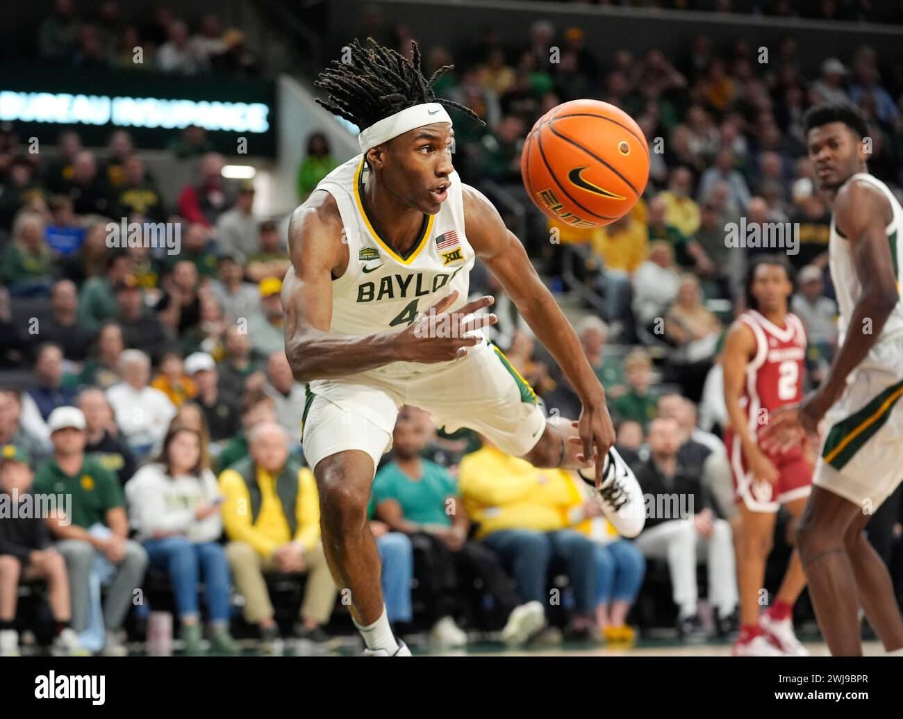Baylor guard Ja'Kobe Walter (4) keeps the ball in play during the ...