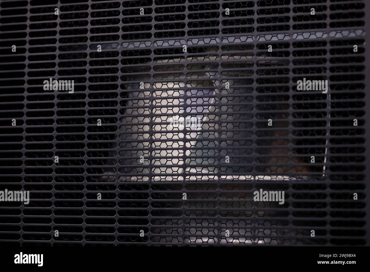 Close up of turbine blower fan and perforated vent grill. Precision air ...