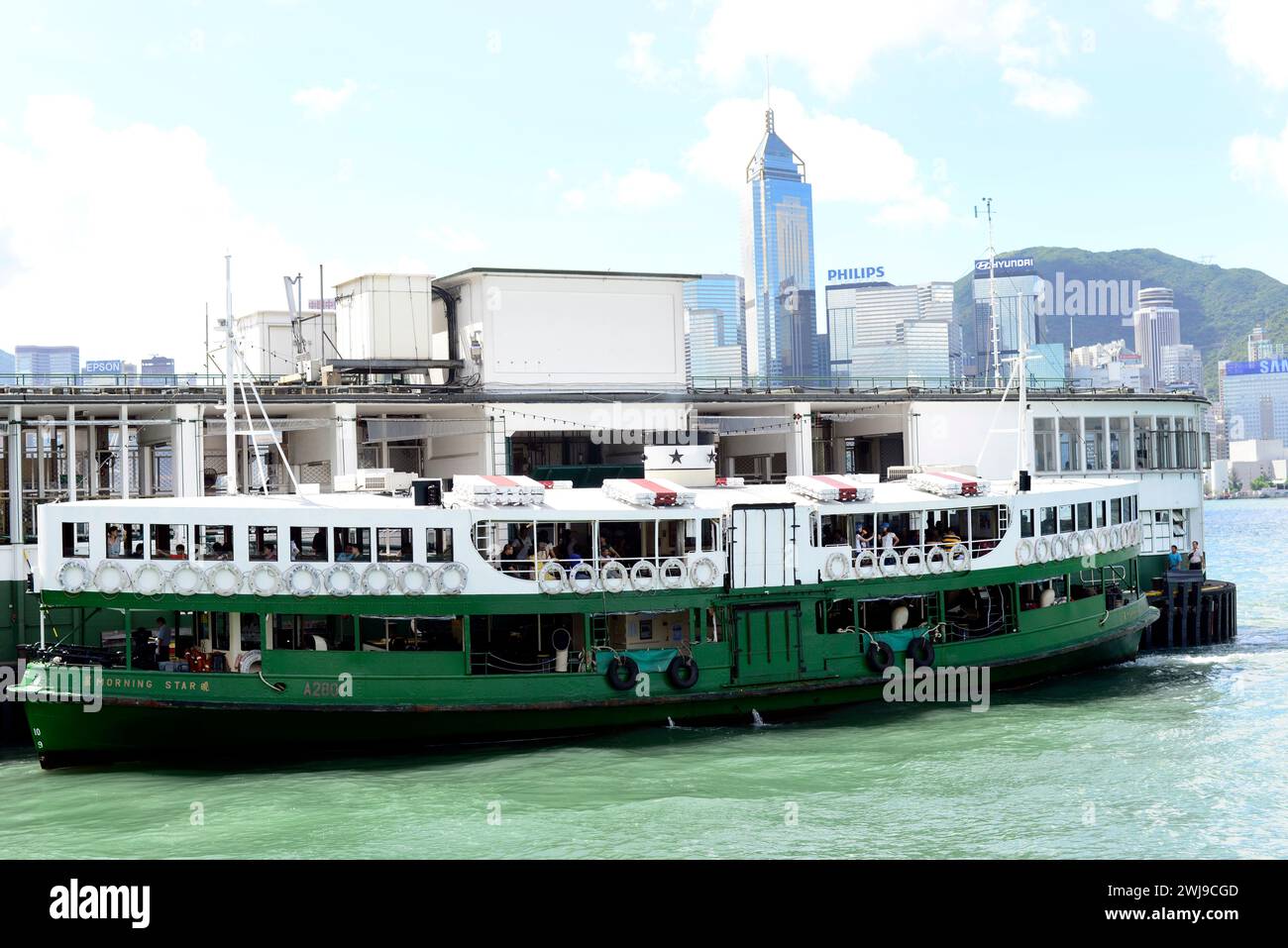 The Morning Star 'Star Ferry' docking at the pier in Tsim Sha Tsui in Kowloon, Hong Kong Stock ...