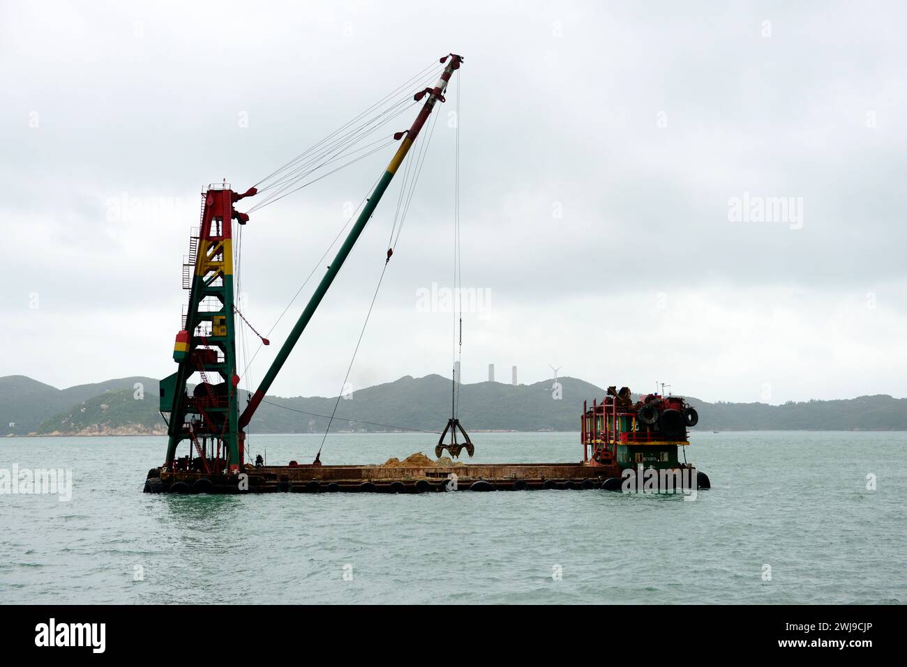 A Sand barge near Ap Lei Chau Island bringing sand and building ...