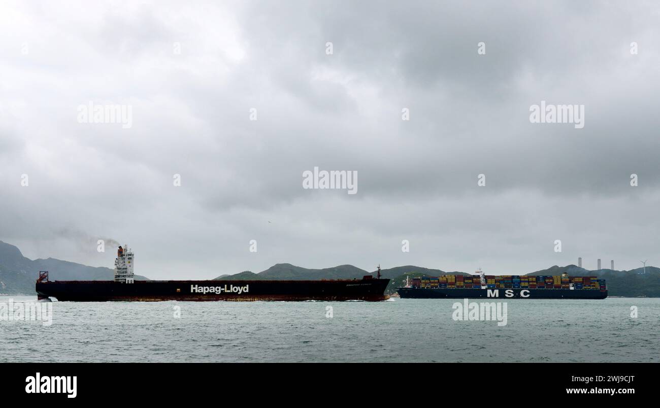 Container ships crossing the busy East Lamma Channel in Hong Kong Stock ...