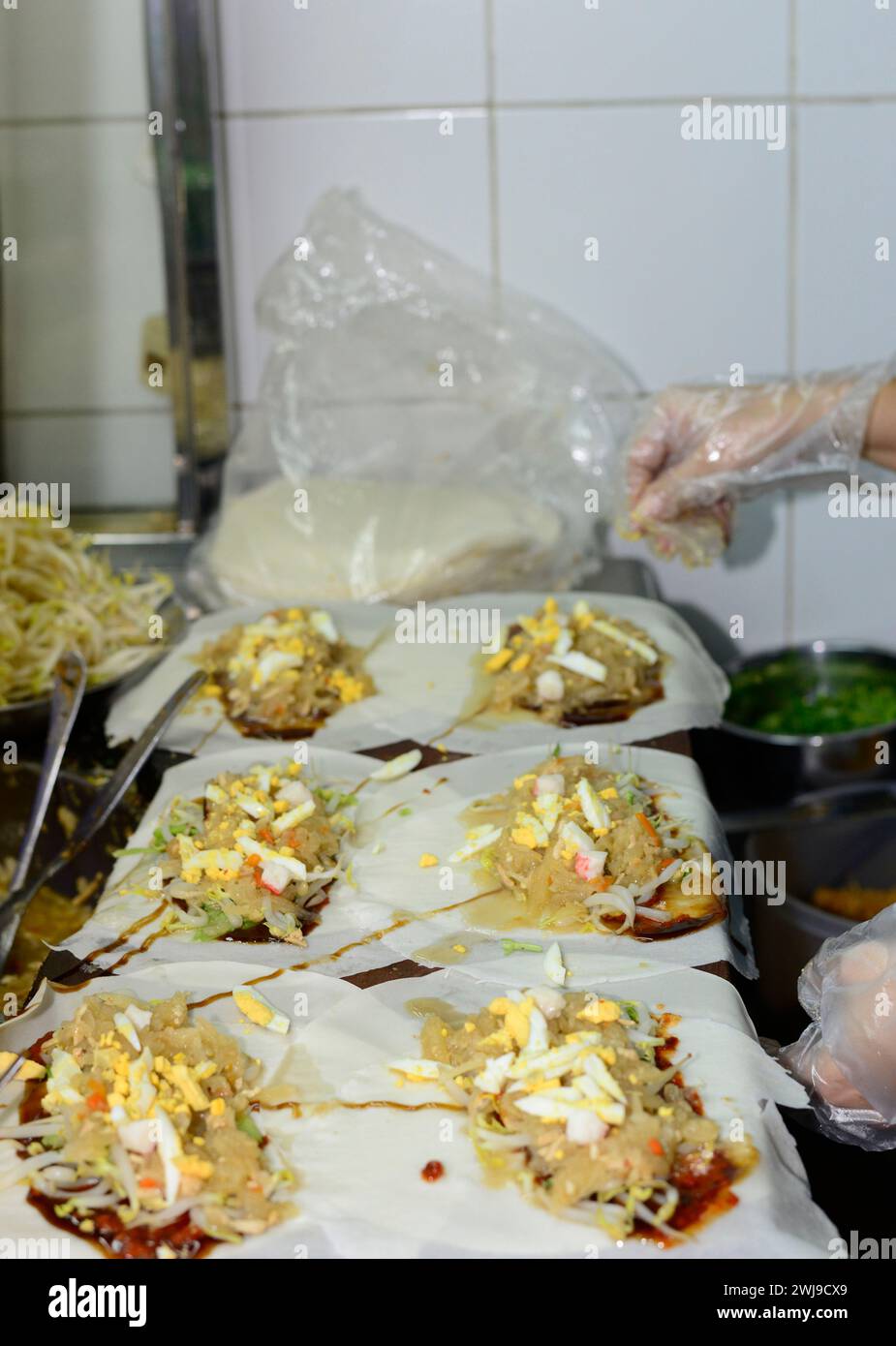 Popiah is a large spring roll popular in Singapore Stock Photo - Alamy
