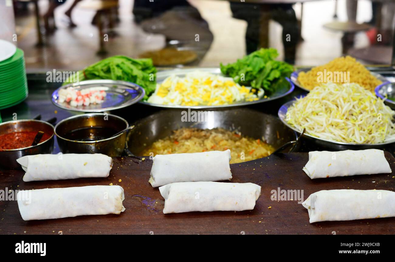 Popiah is a large spring roll popular in Singapore Stock Photo - Alamy