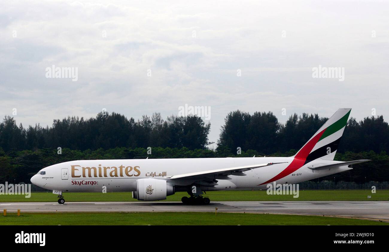 An Emirates Sky Cargo plane ready to takeoff from Changi Airport in ...