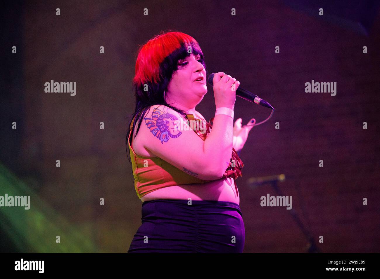 Katie Hall of the band Chroma performing live onstage Stock Photo - Alamy