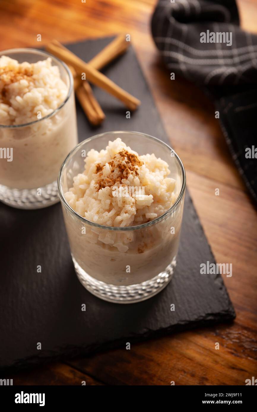 Rice pudding. Sweet dish made by cooking rice in milk and sugar, some ...