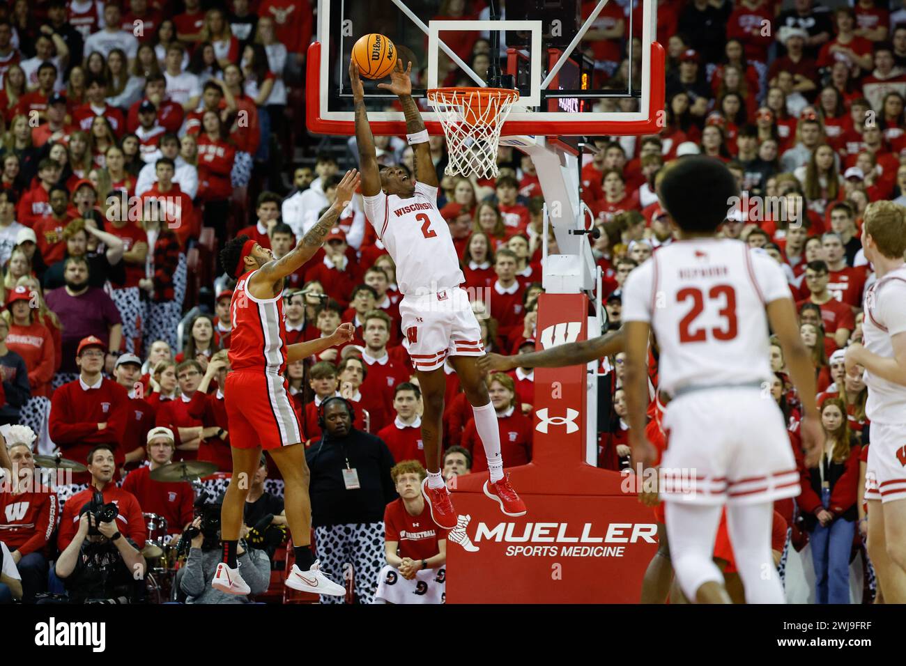 Madison, WI, USA. 13th Feb, 2024. Wisconsin Badgers guard AJ Storr (2) misses an alley oop dunk ...