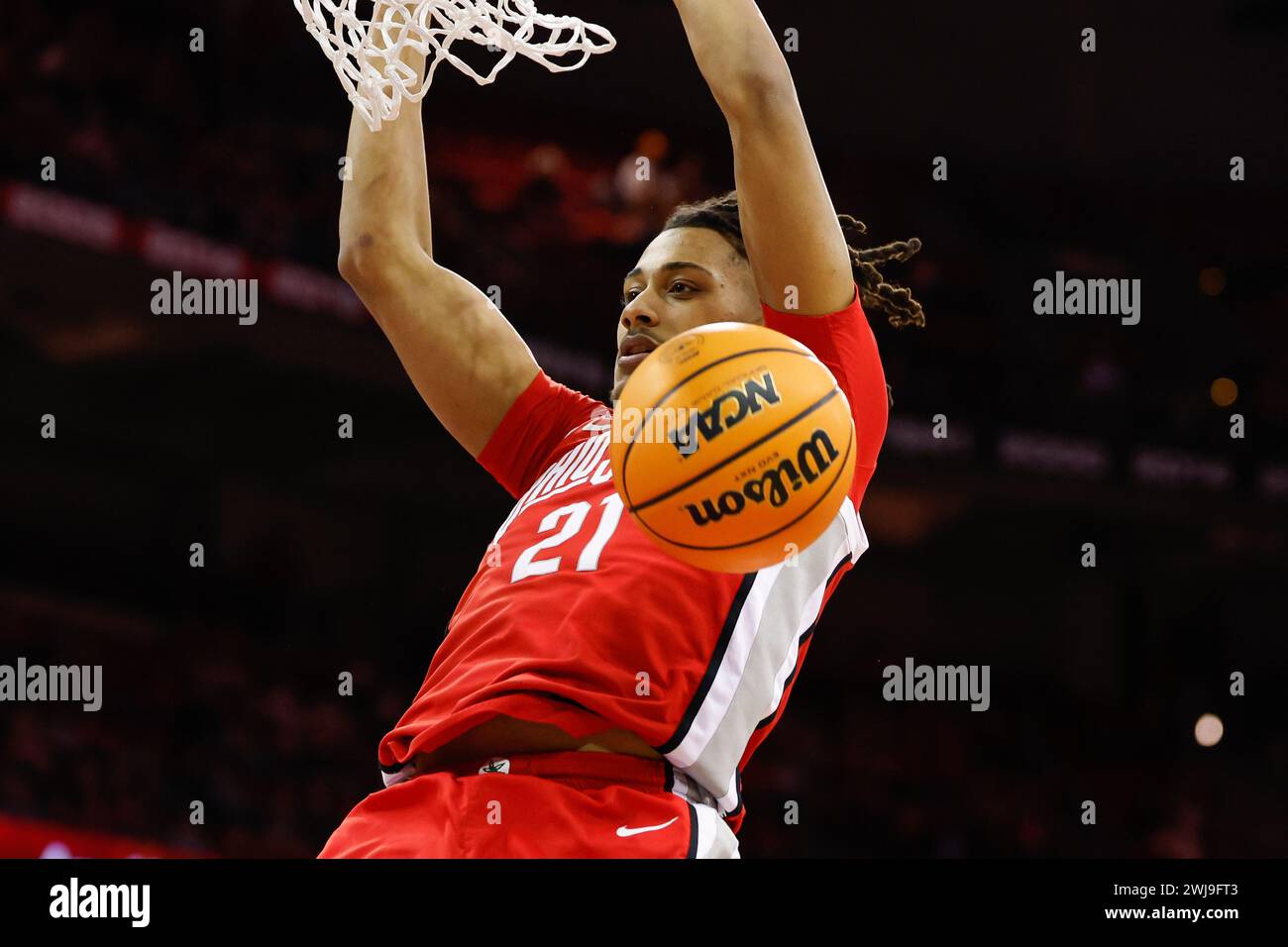 February 13, 2024: Ohio State Buckeyes forward Devin Royal (21) dunks ...