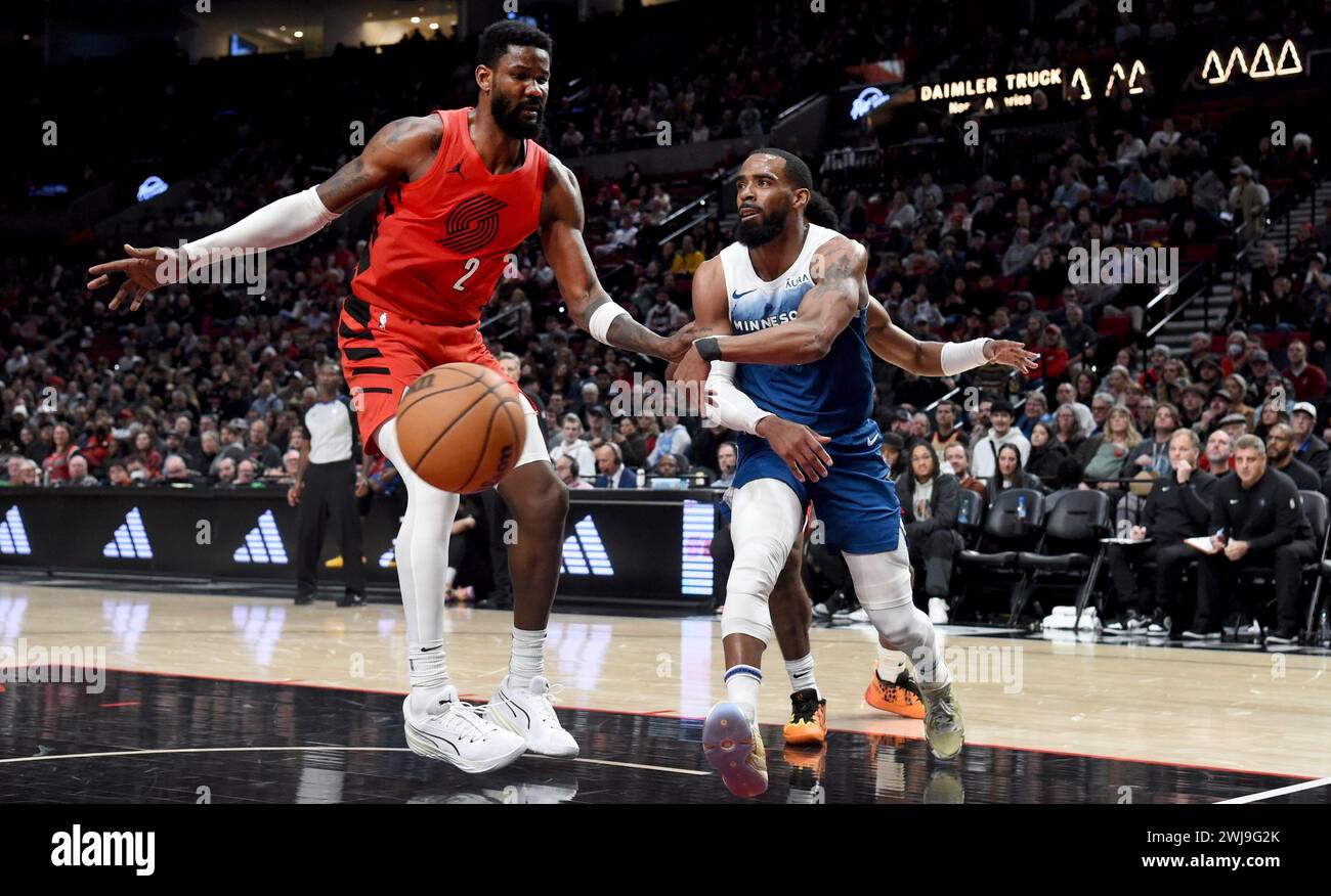 Minnesota Timberwolves guard Mike Conley, right, passes the ball as ...