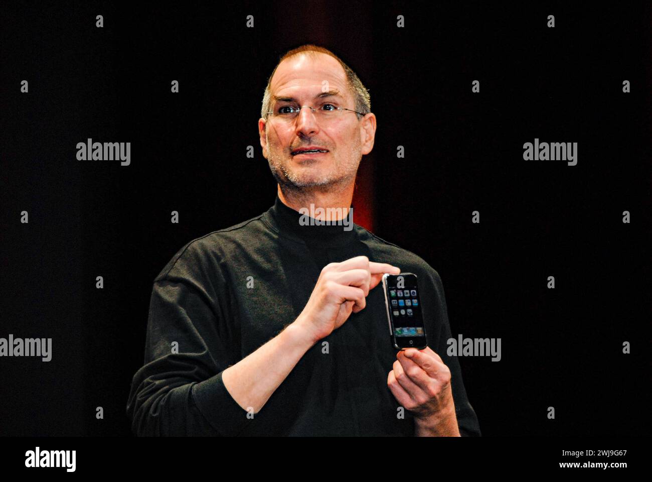 Apple's chief executive officer Steve Jobs unveils a new mobile phone ...