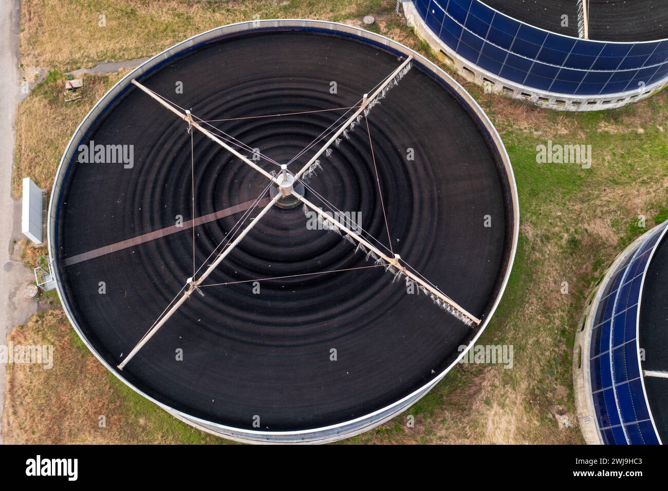 Aerial top view of massive round water tank for water filtration in ...