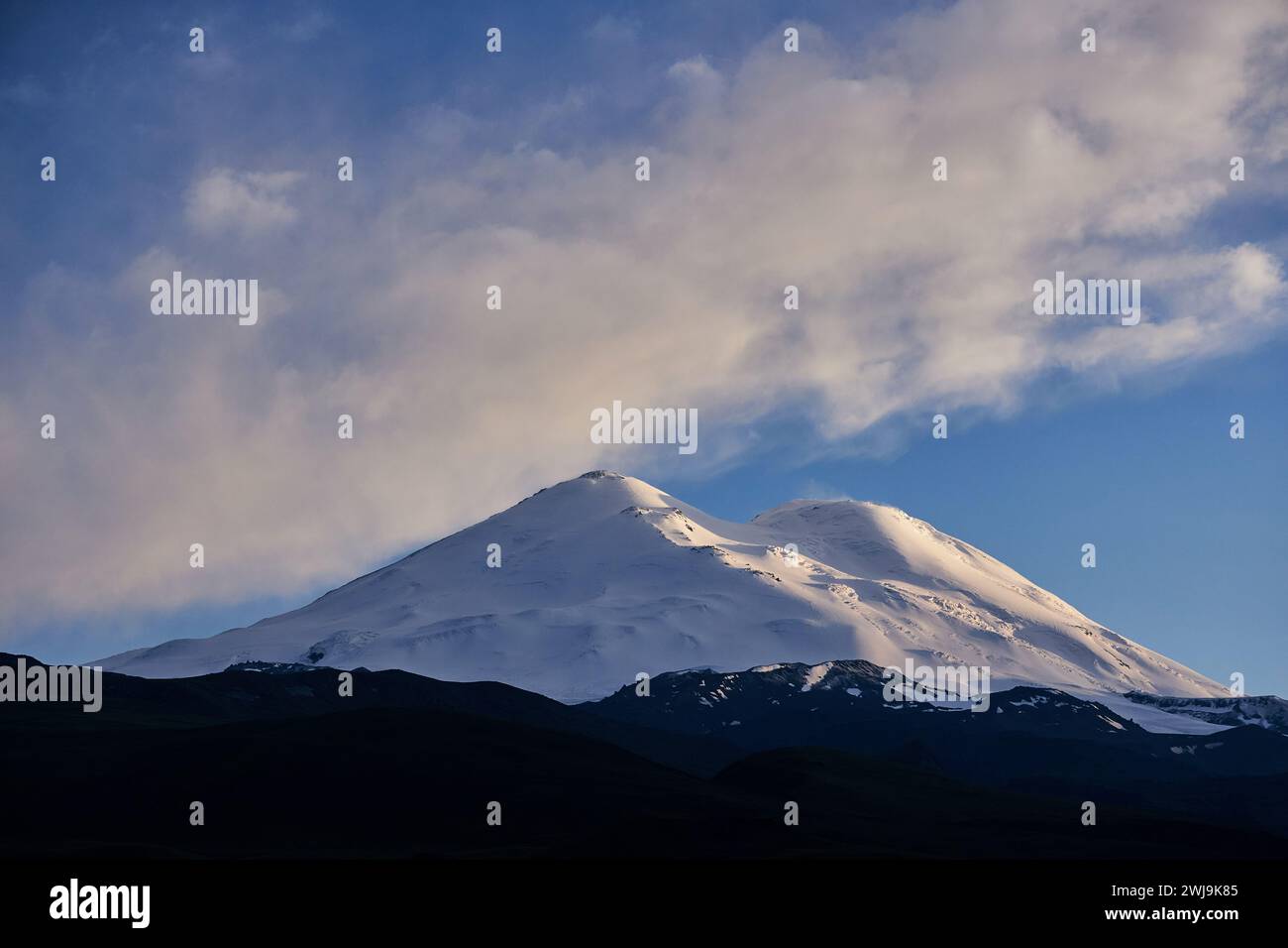 Russia Caucasus, Mount Elbrus towers majestically, adorned in pristine ...