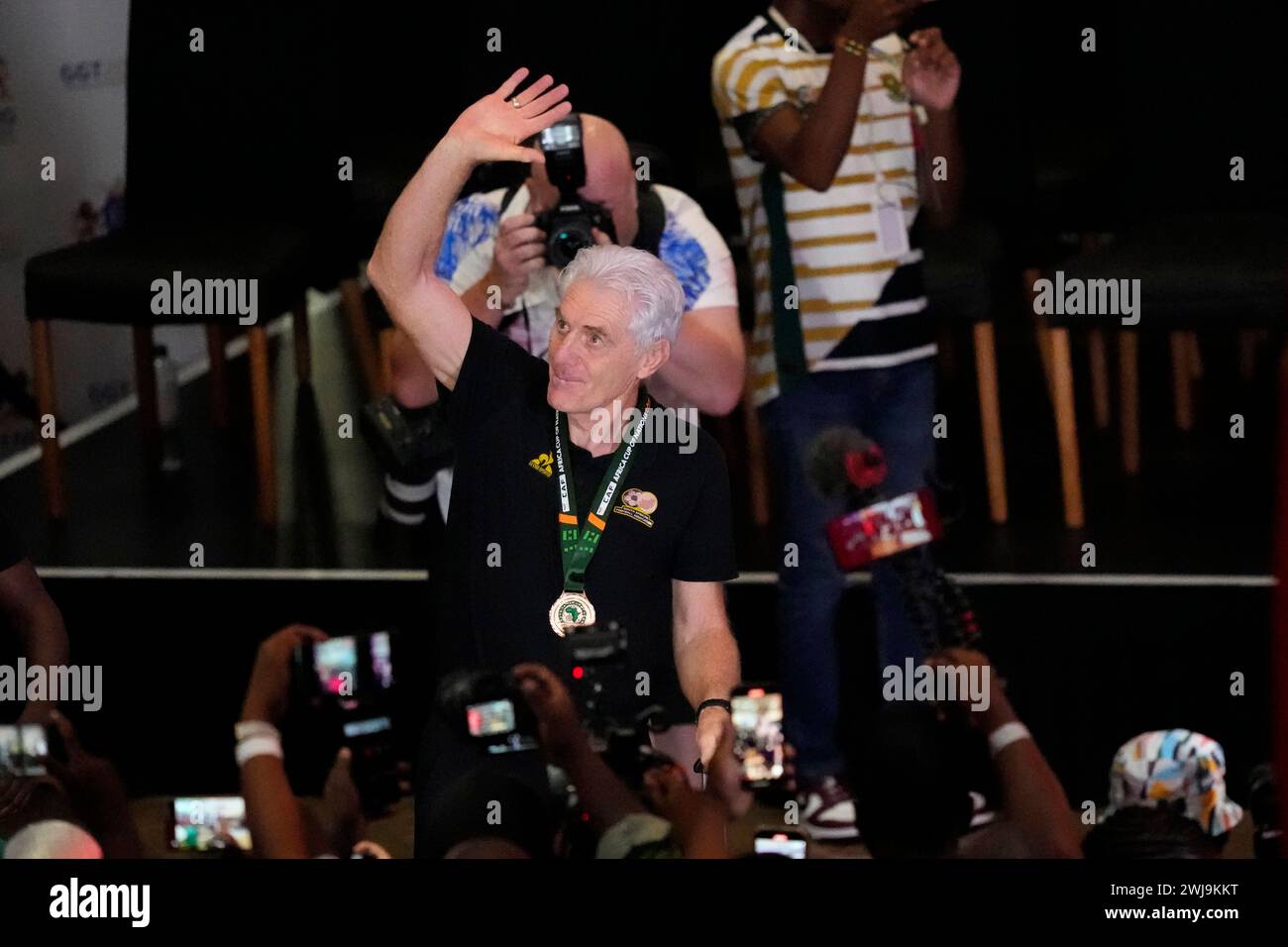 South Africa's head coach Hugo Broos acknowledges fans after arriving ...