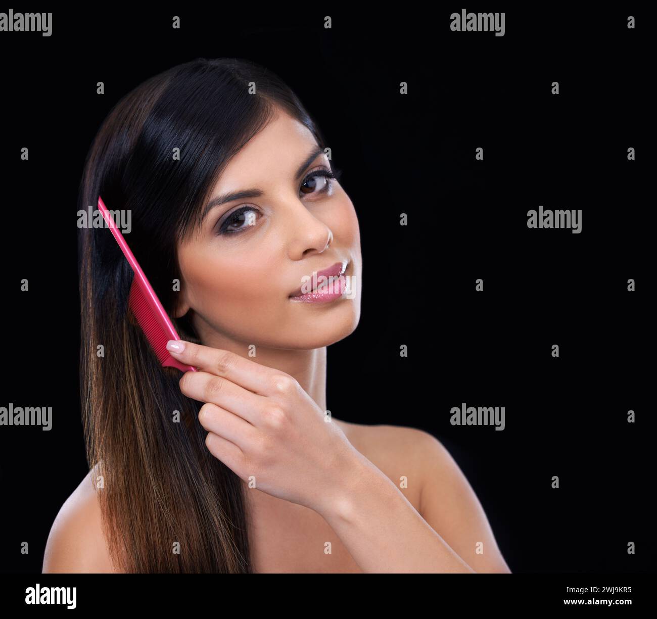 Woman, portrait and hair or comb with beauty on black background for ...