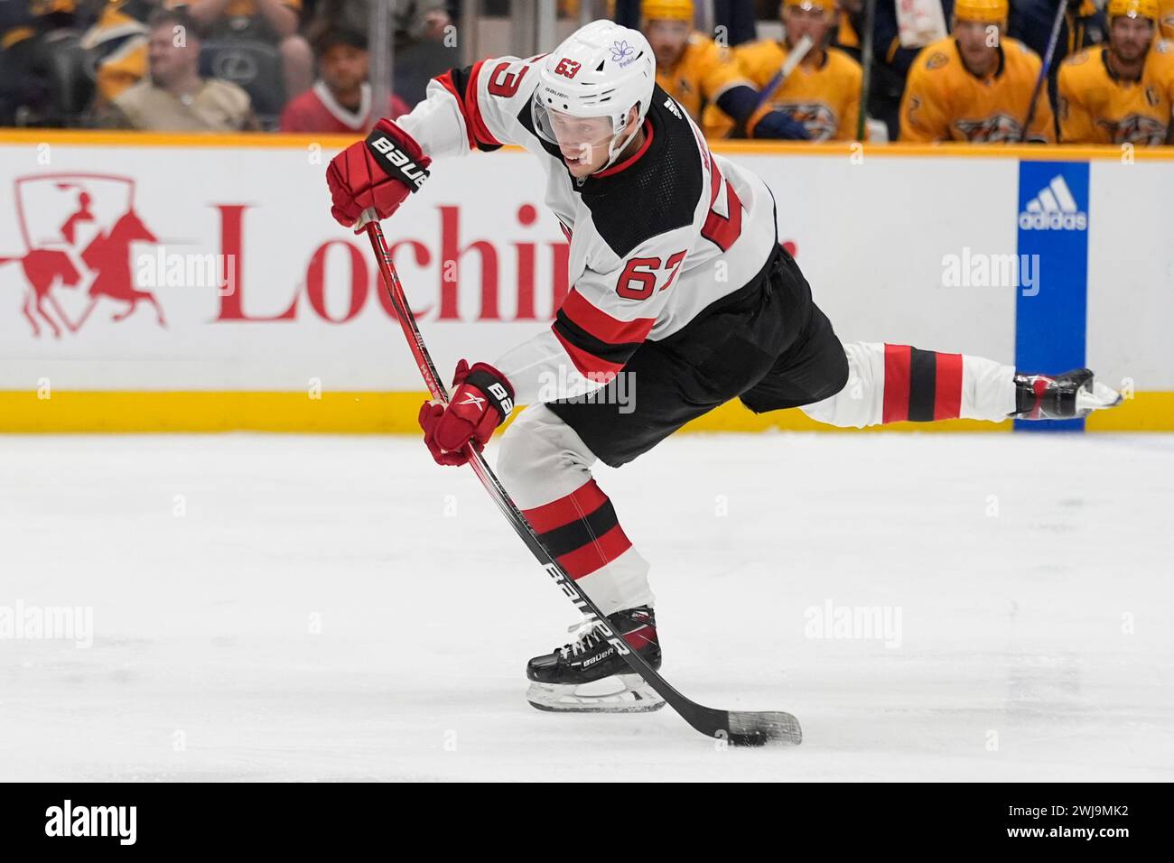 New Jersey Devils left wing Jesper Bratt (63) plays during the third period of an NHL hockey ...