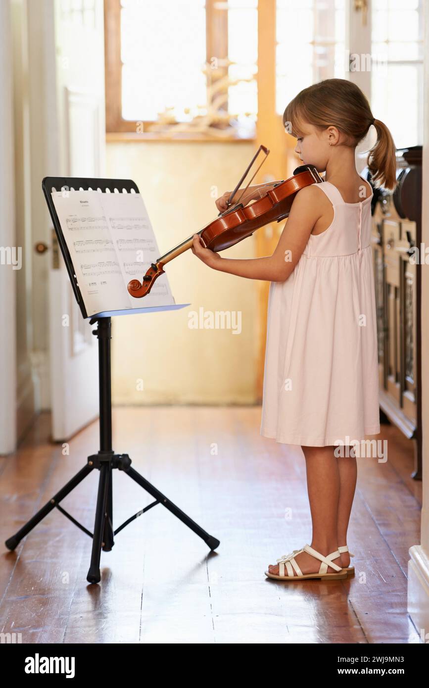 Child standing reading notes hi-res stock photography and images - Alamy