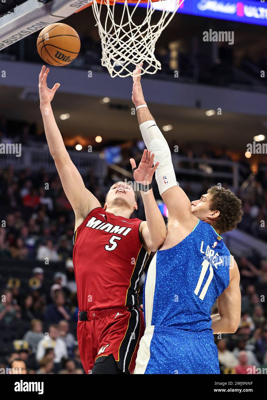 Milwaukee, USA. 13th Feb, 2024. Miami Heat forward Nikola Jovic (L ...