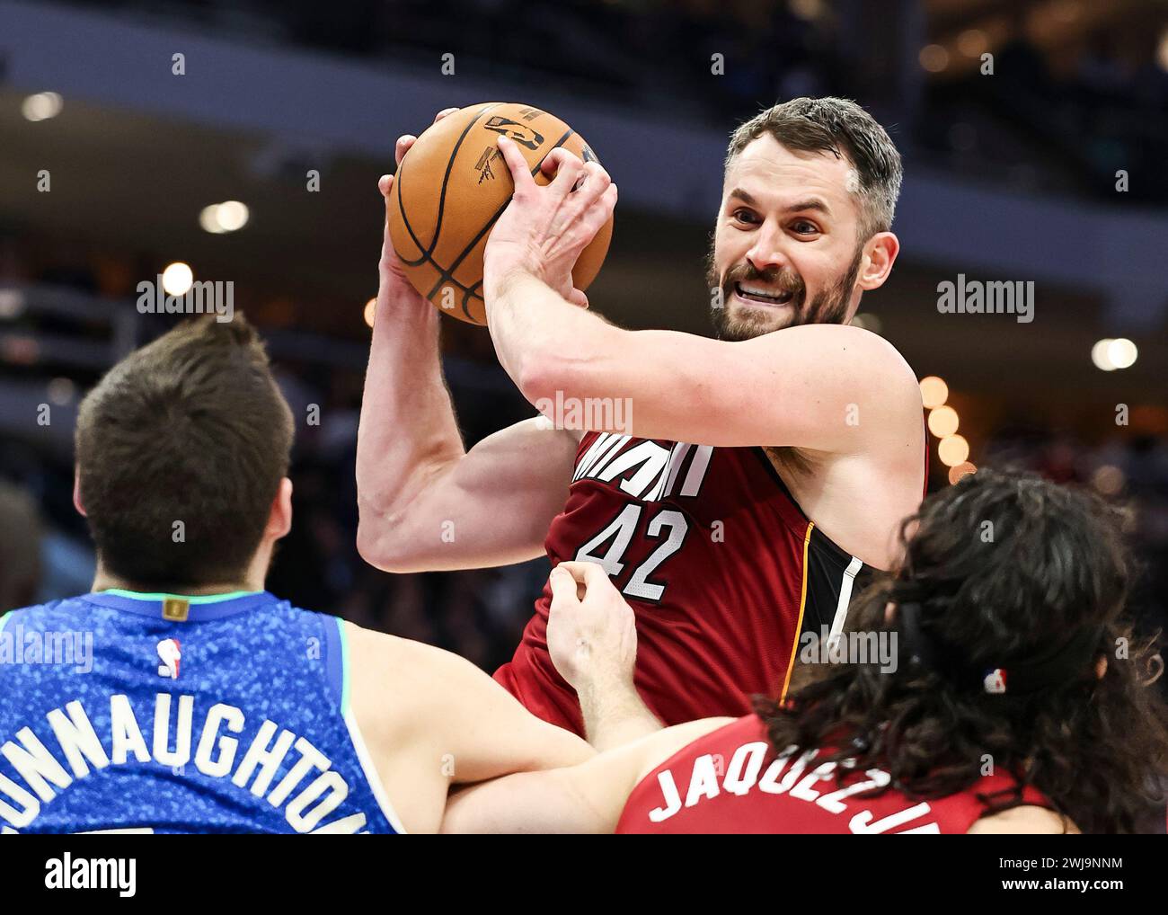 Milwaukee, USA. 13th Feb, 2024. Miami Heat forward Kevin Love grabs a ...