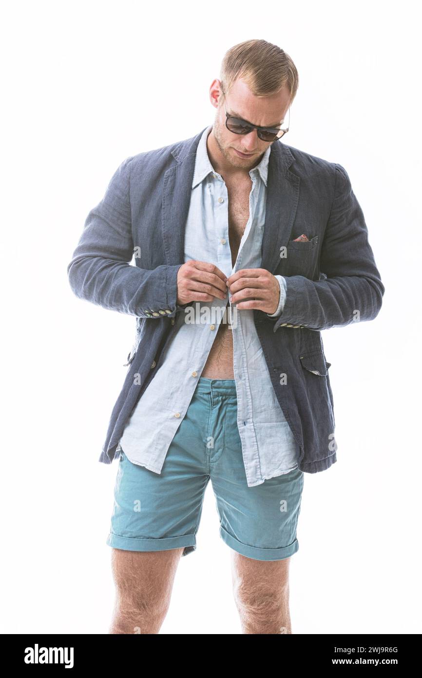 Fashion, button and man in studio with clothes, trendy blazer, stylish ...