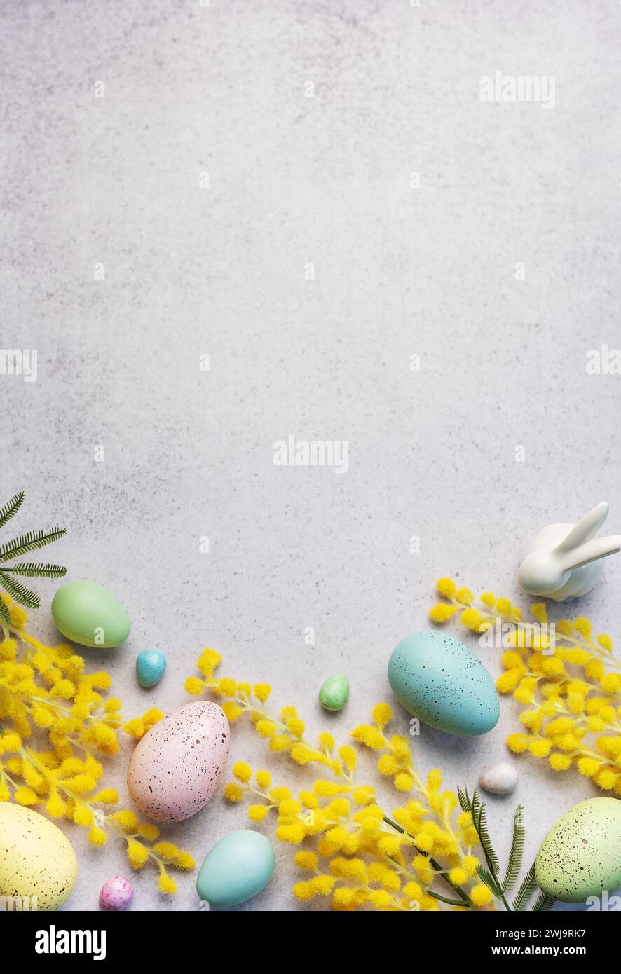 This image features a festive Easter arrangement of pastel-colored eggs ...