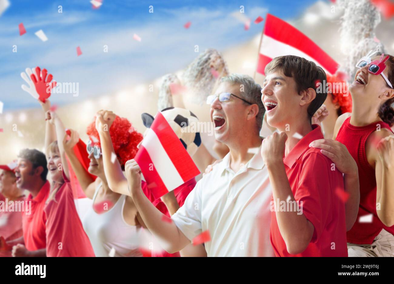 Austria football supporter on stadium. Austrian fans on soccer pitch ...