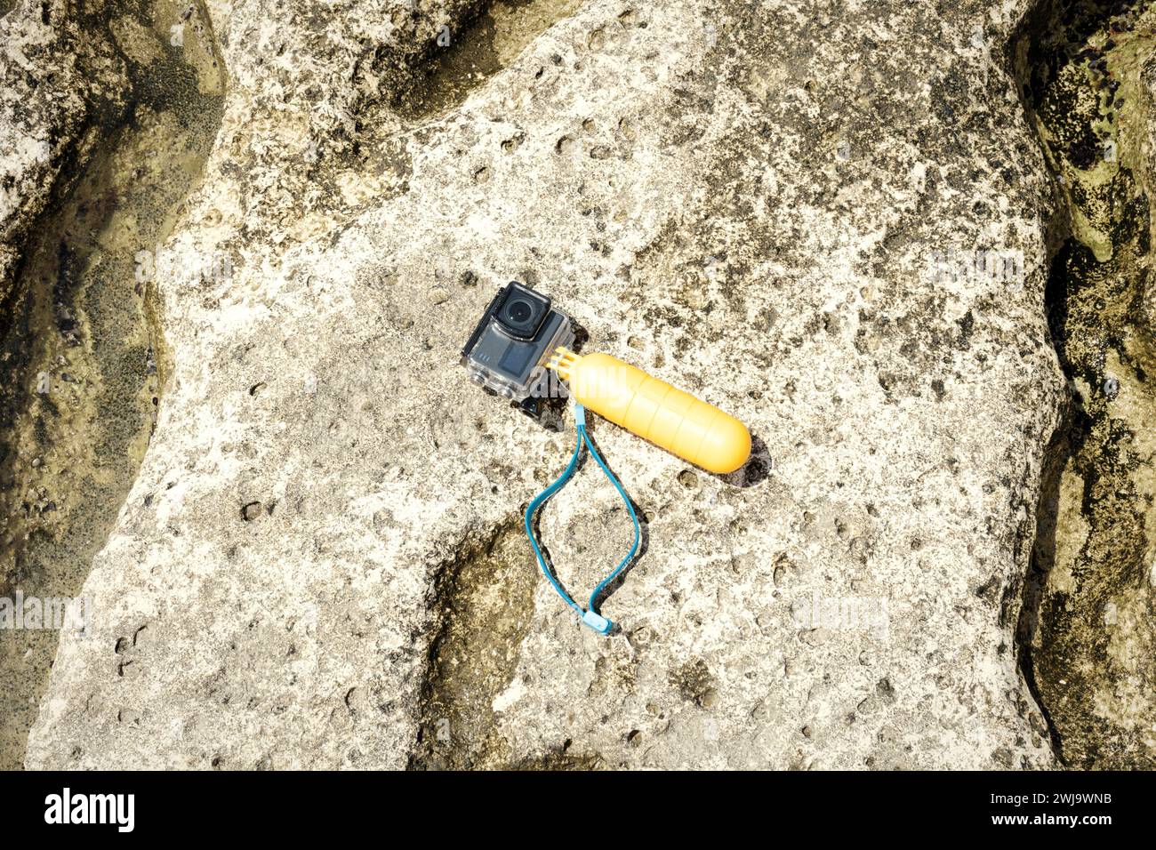 Compact underwater photo and video camera. Rocky shore of the Caspian ...