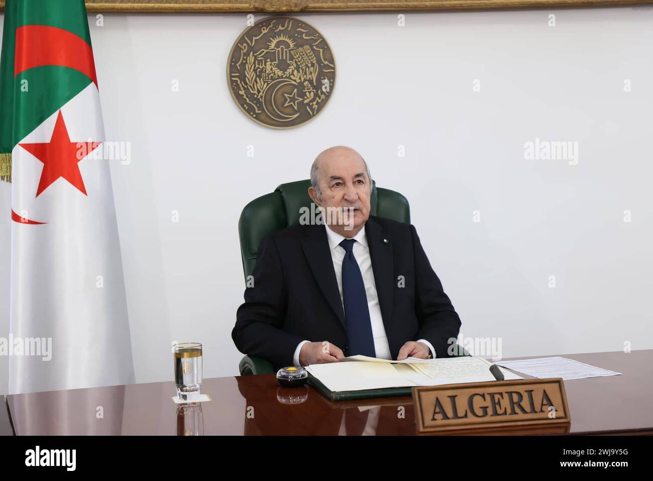 Algerian President Abdelmadjid Tebboune speaks via video conference ...