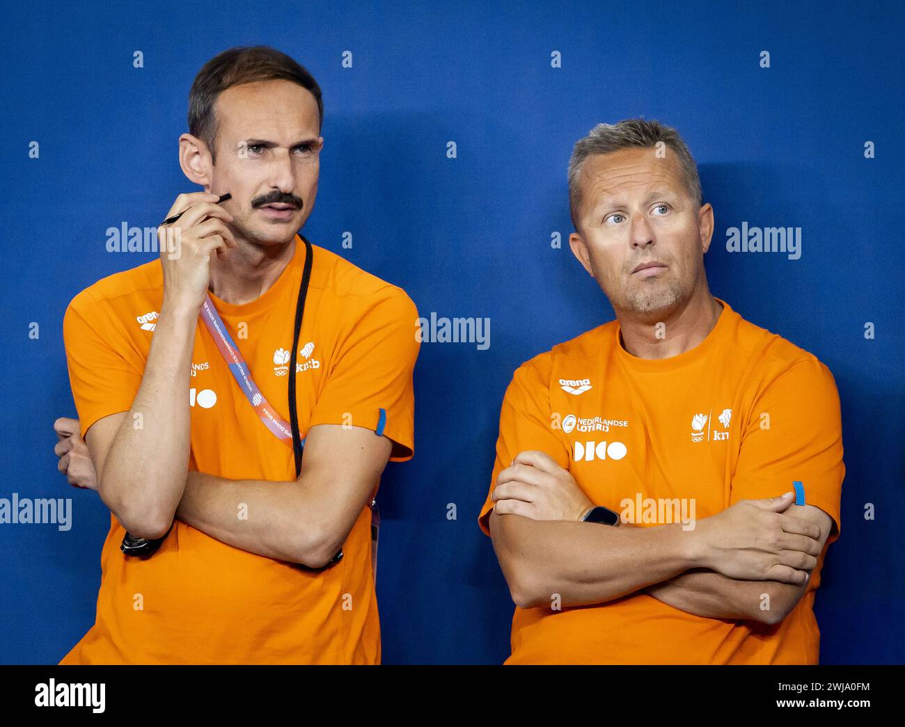 DOHA - Coach Patrick Pearson and coach Mark Faber prior to the 4 x 100 ...