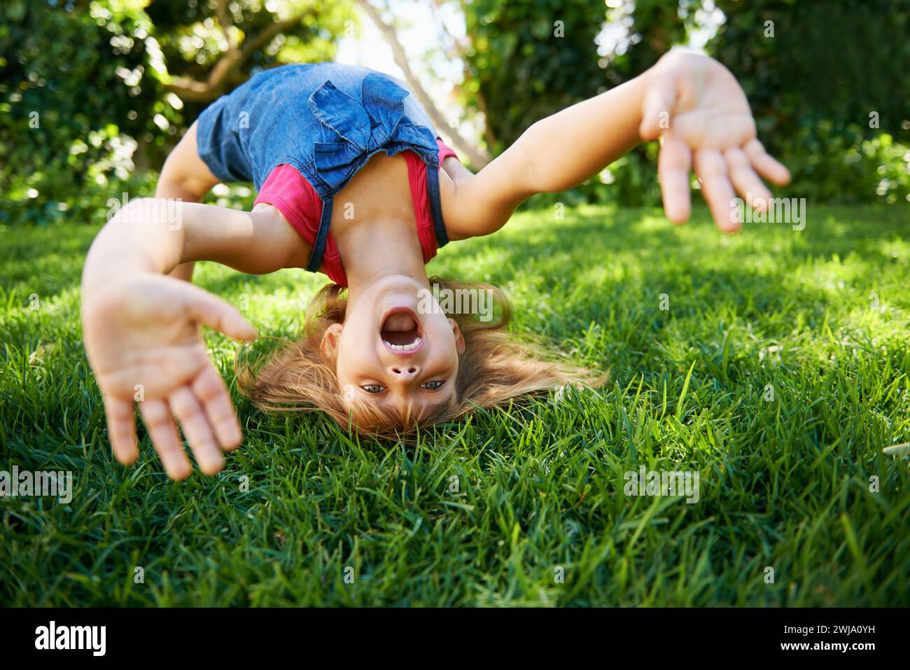 Child, back and bend or bridge for play in summer or flexibility game ...