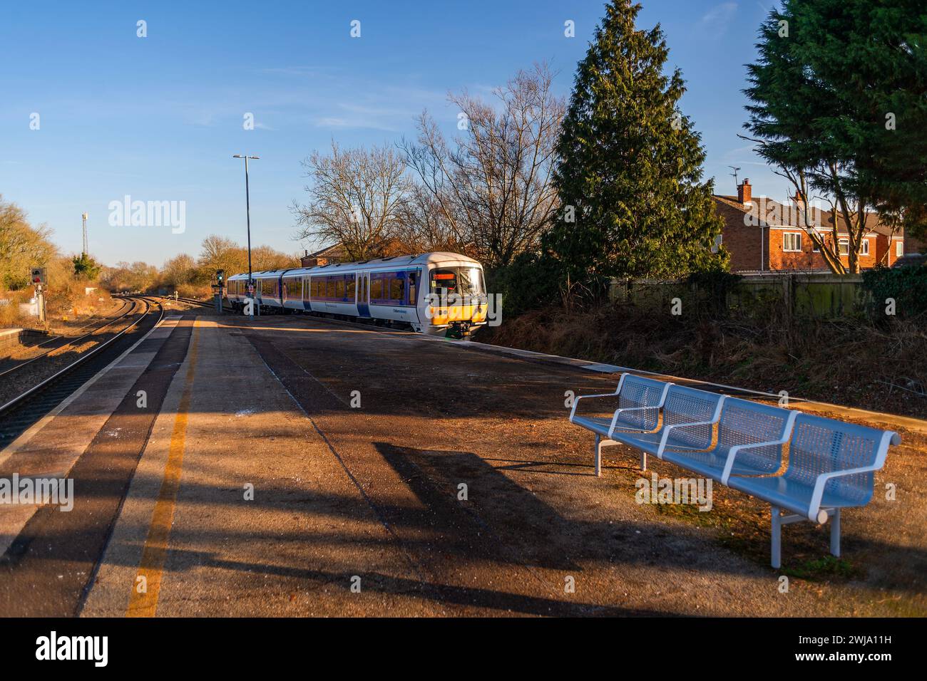 generic british rail commuter passenger railway train at railway ...