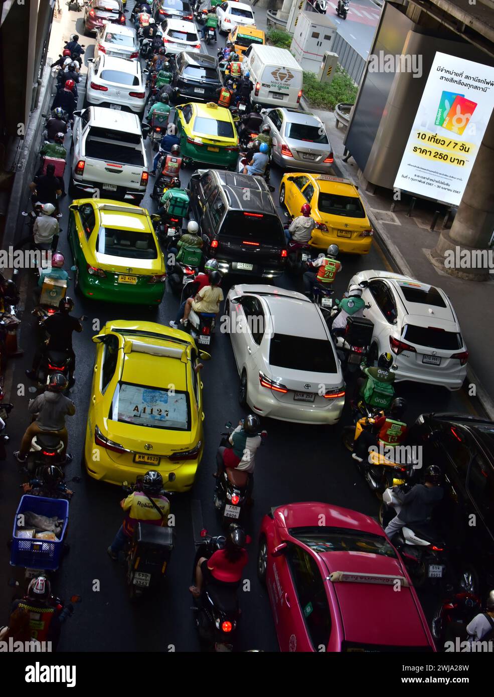 Overhead view of a traffic jam of cars at a standstill on Silom Road ...