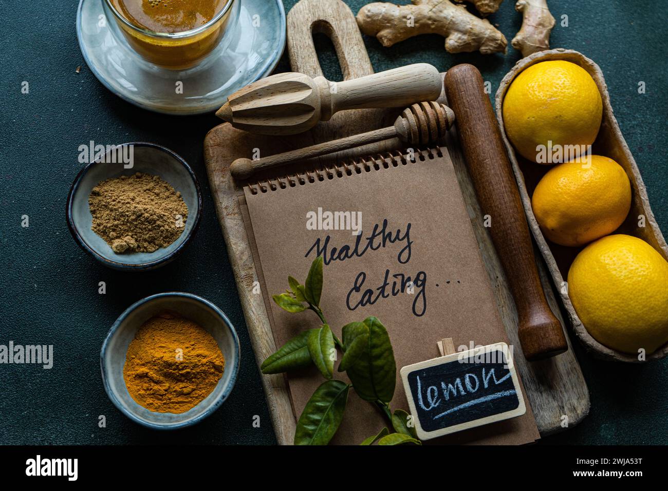 A flat lay of healthy food ingredients with a notebook labeled 'Healthy ...
