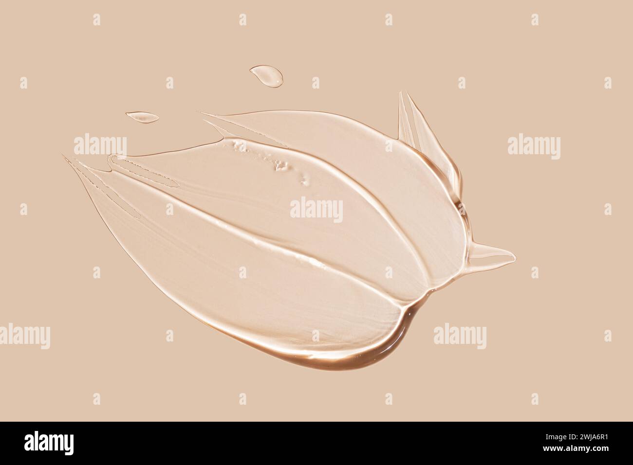 High-resolution image showcasing a textured swipe of beige makeup ...