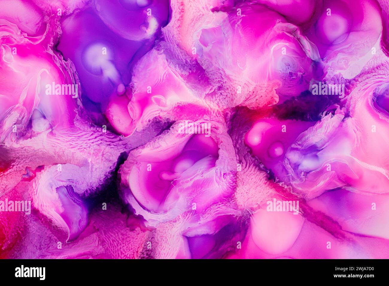 Abstract art background with vivid pink and purple ink patterns ...