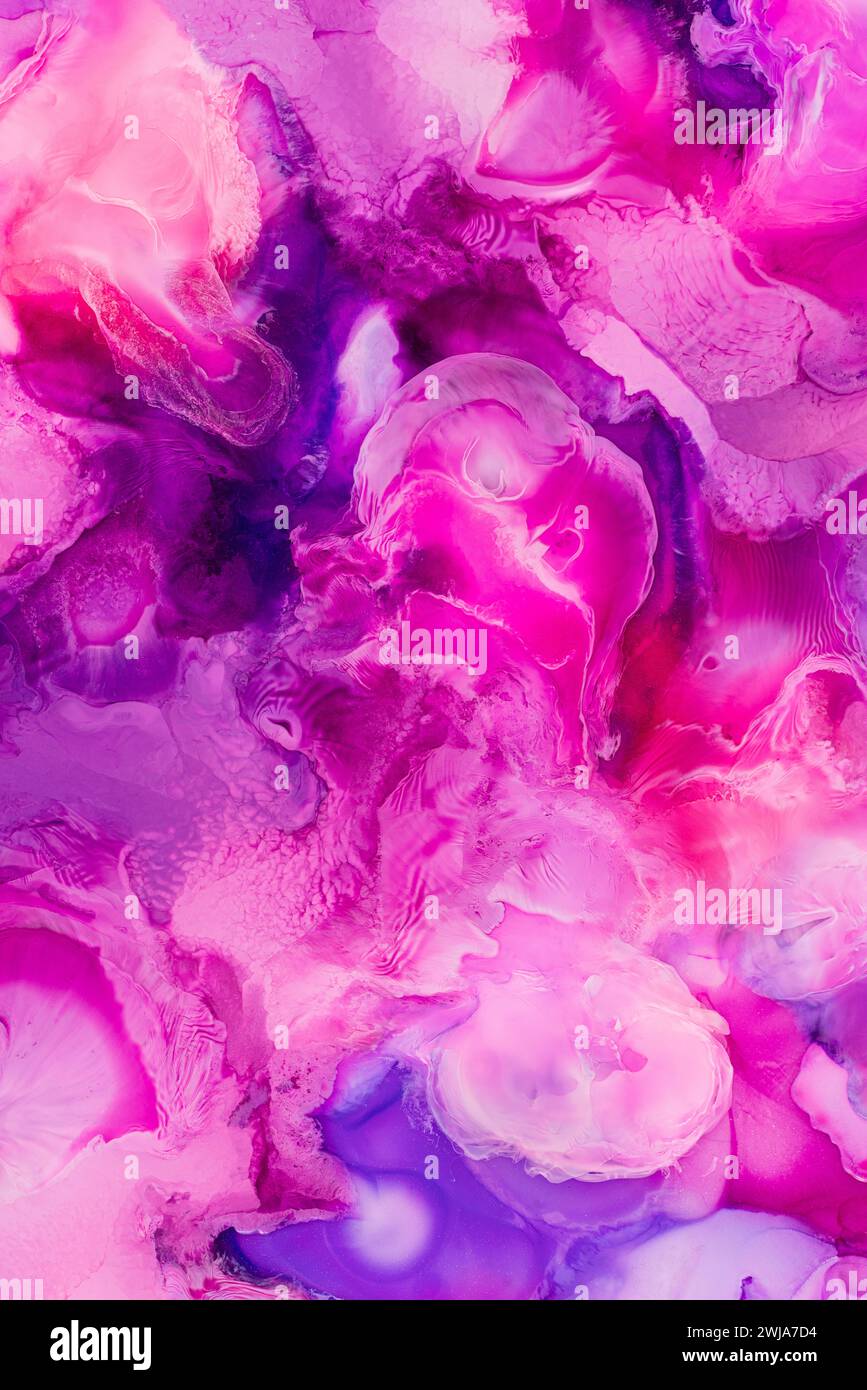 An abstract and dreamy fusion of pink and purple hues in a fluid art ...
