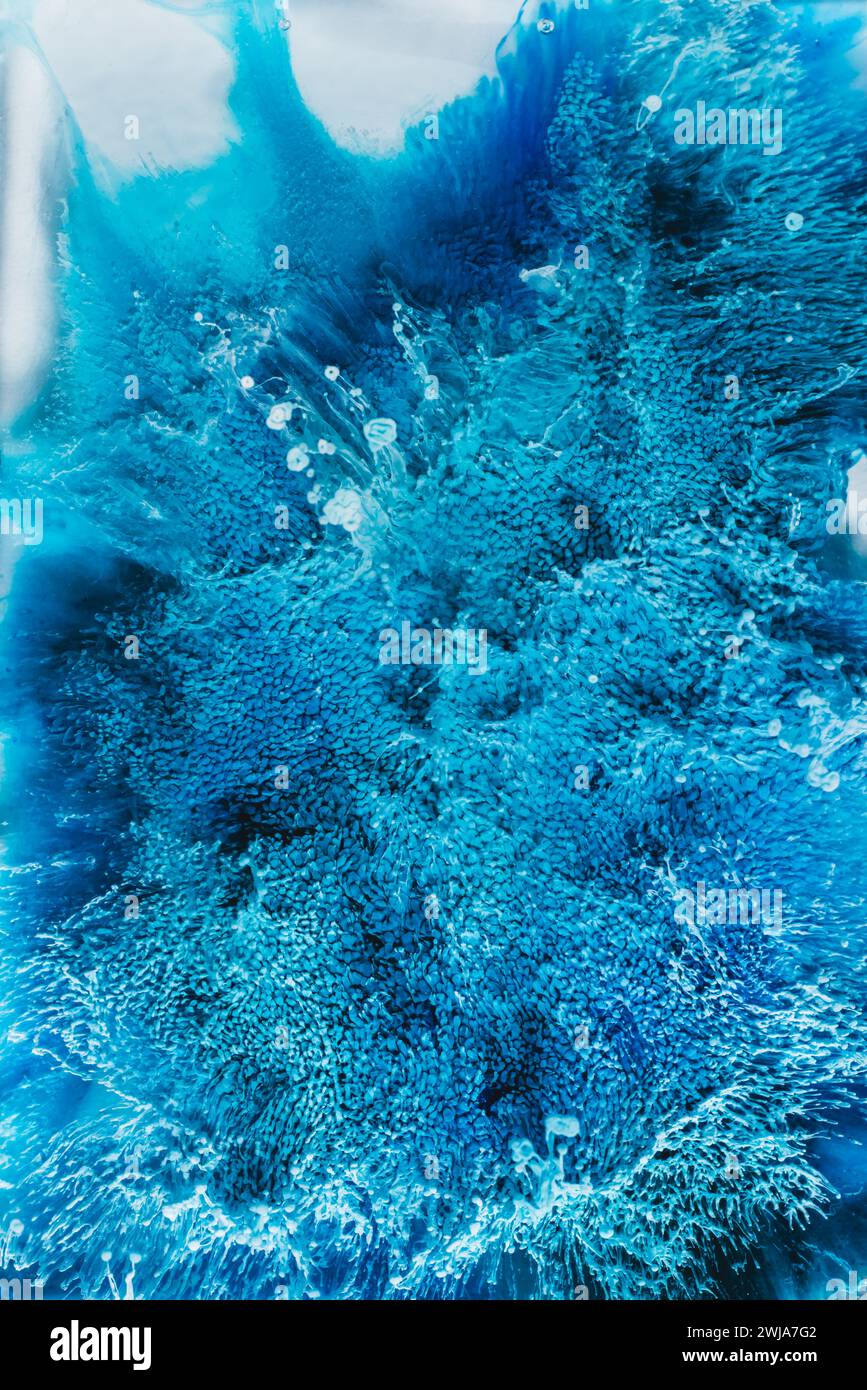 Abstract image displaying vibrant blue and turquoise watercolor ...