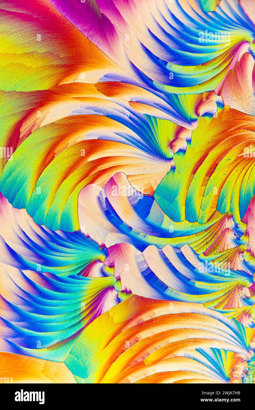 Salicylic acid crystals magnified to reveal a vibrant, flowing pattern ...