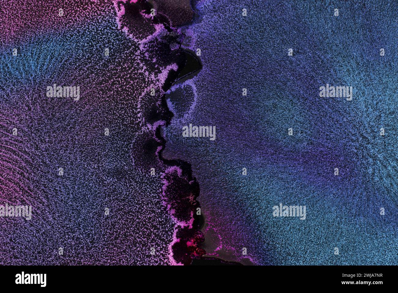 Close-up of a vibrant purple and blue glitter texture with a sparkling ...