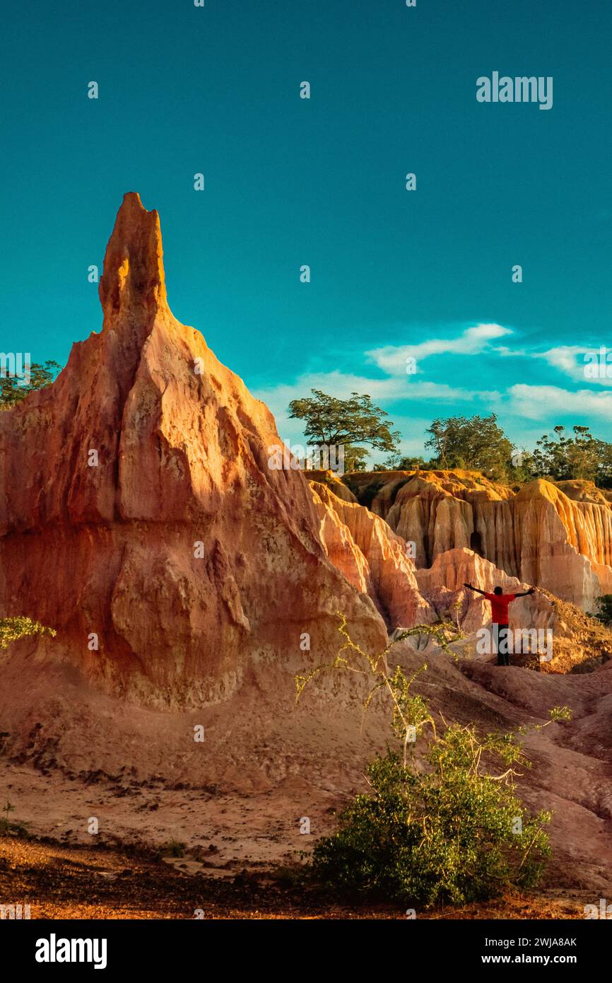Tourists dwarfed by rock formations at Marafa Depression - Hell's ...