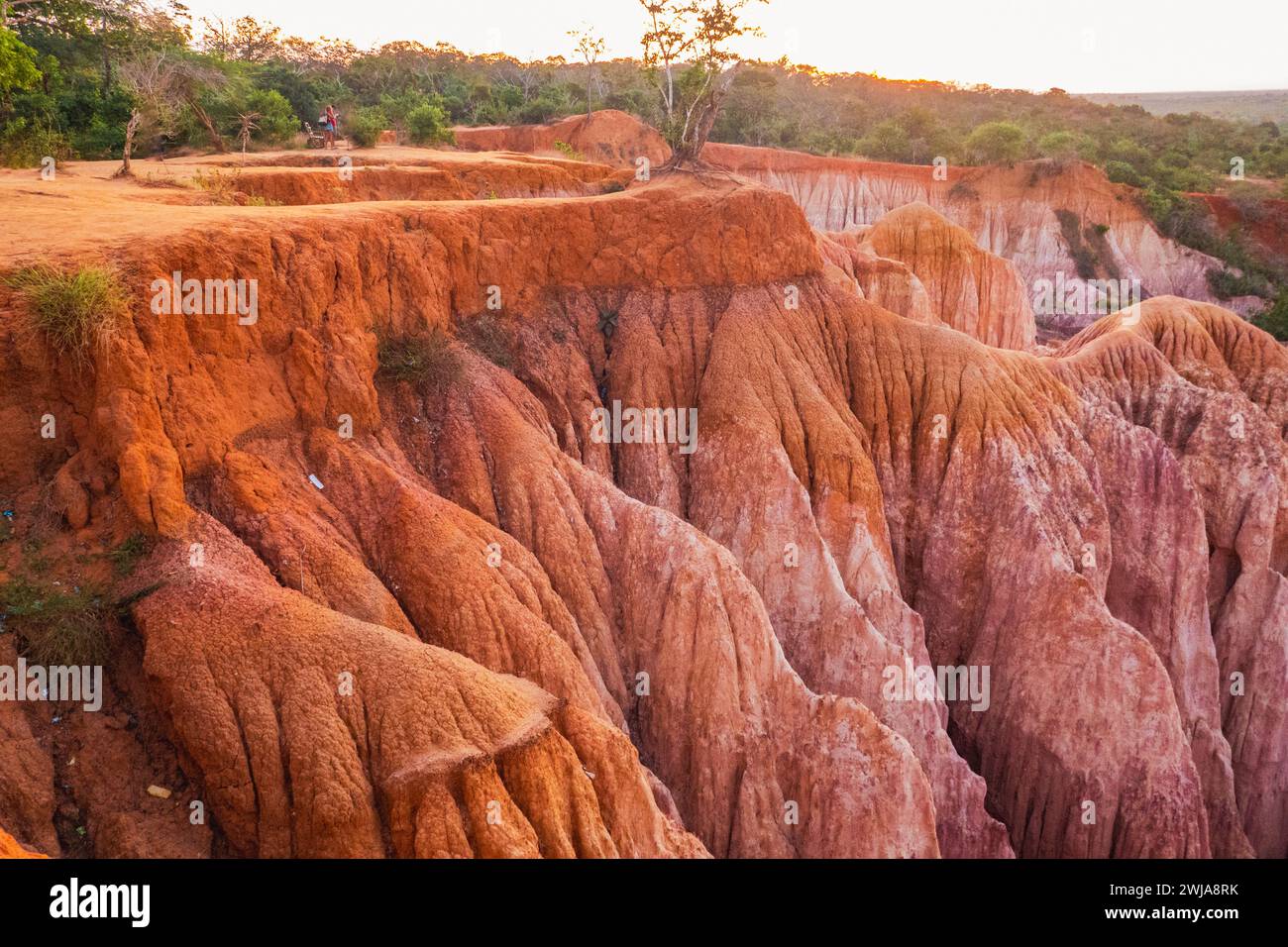 Tourists dwarfed by rock formations at Marafa Depression - Hell's ...