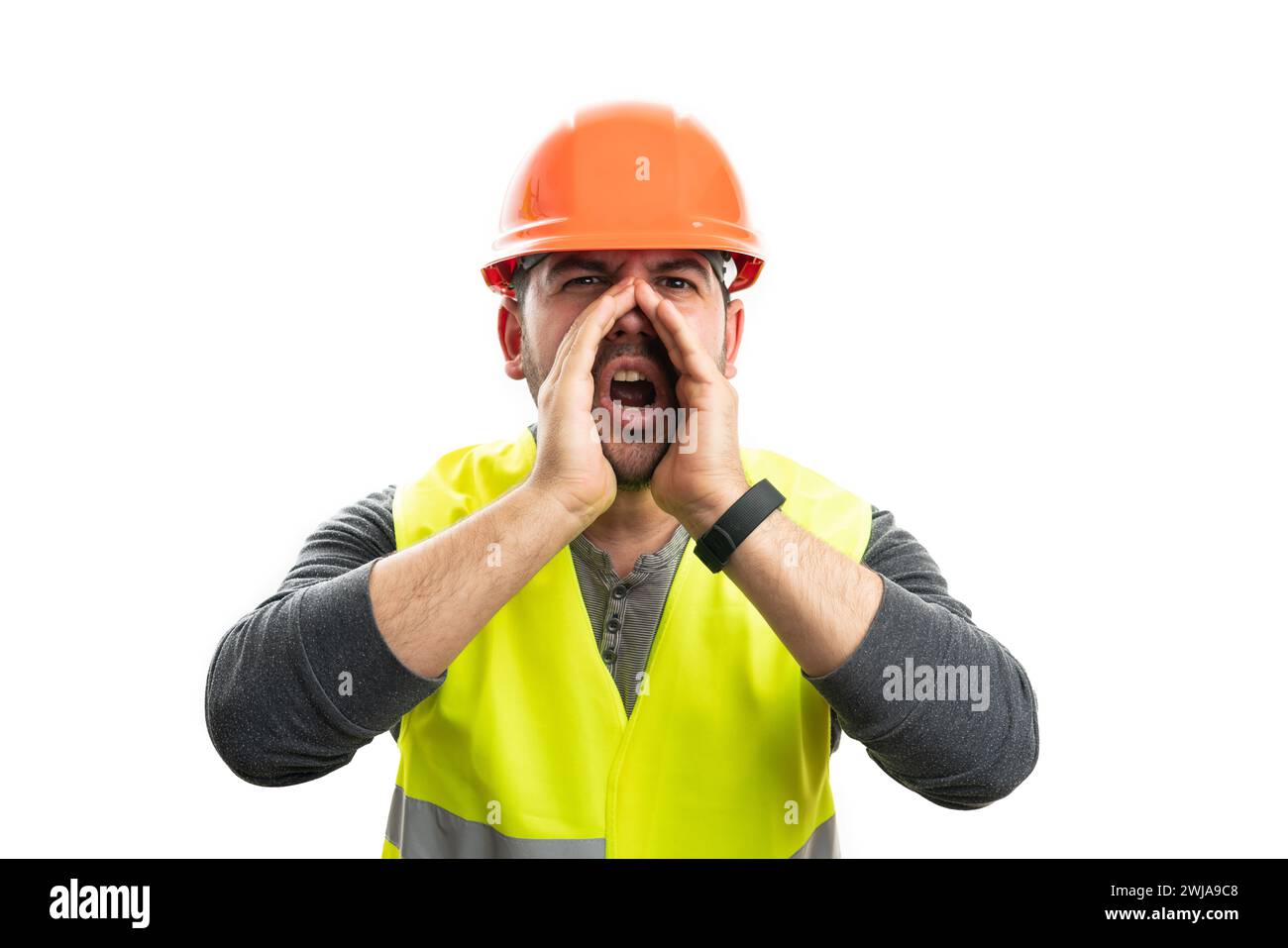 Adult male builder in work attire fluorescent yellow vest and safety ...