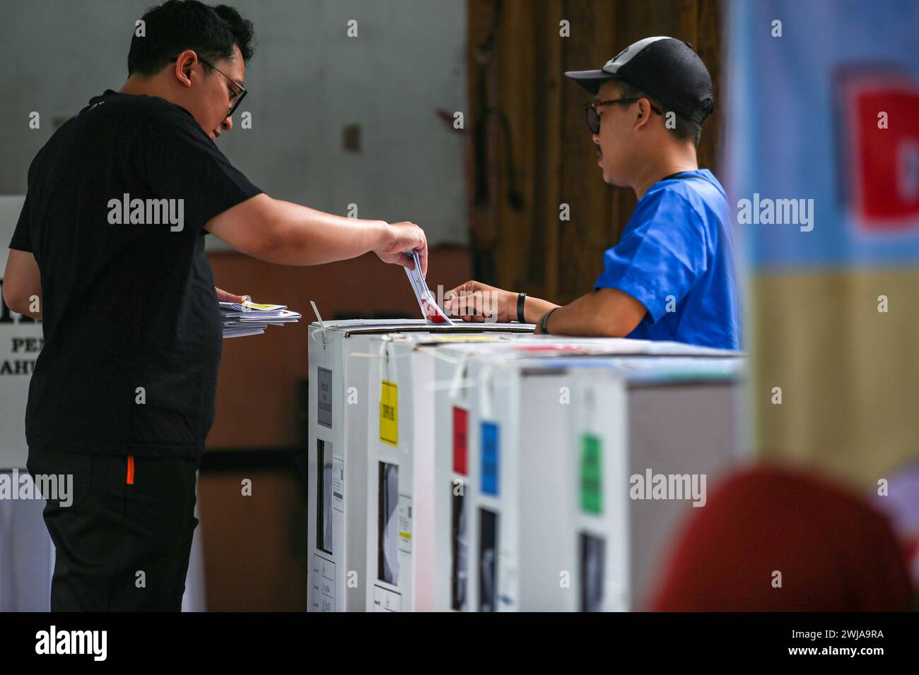 INDONESIA GENERAL ELECTION Voters show their inked fingers after voting ...