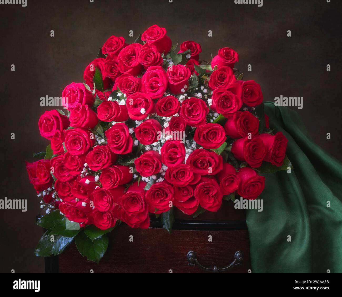 Still life with splendid bouquet of red roses Stock Photo - Alamy