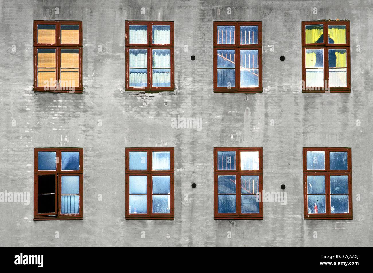 pattern of windows in geometric structure at an old house wall in ...