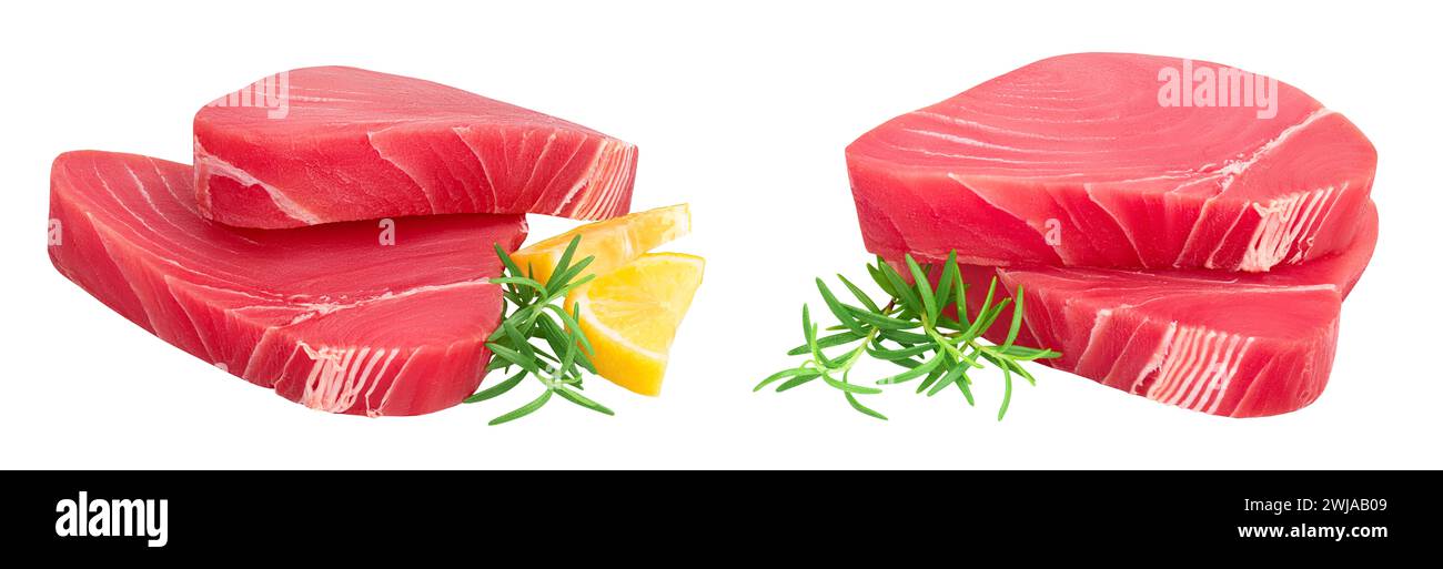 Fresh tuna fish fillet steak with rosemary and lemon isolated on white ...