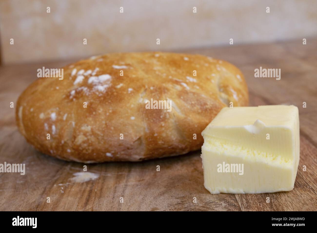 homemade bread loaf and a piece of butter Stock Photo - Alamy