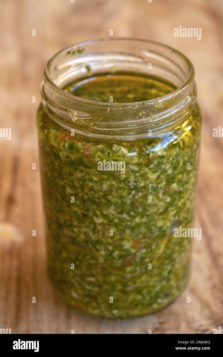 fresh homemade basil pesto placed in a glass jar Stock Photo - Alamy