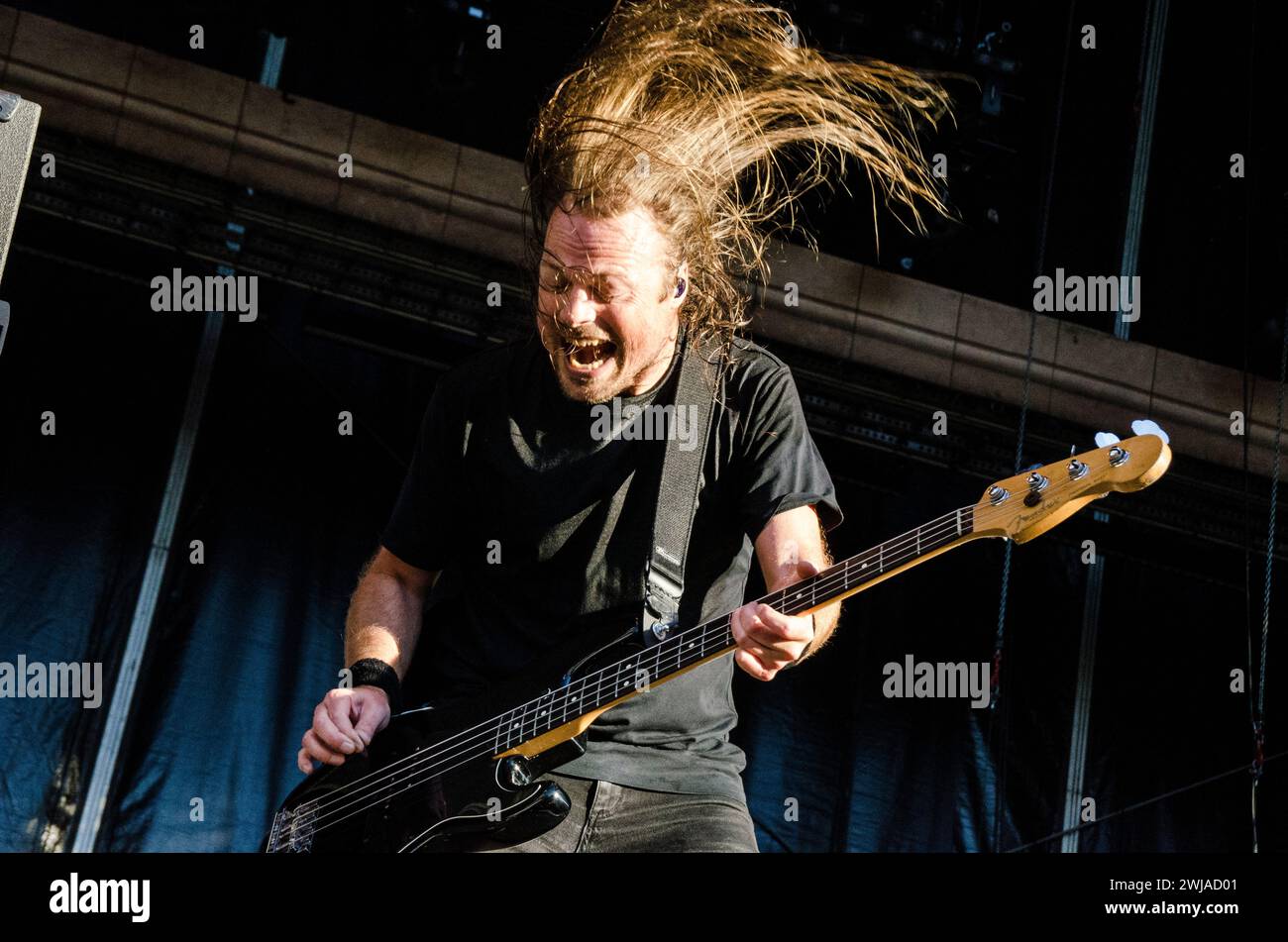 Justin Street of Airbourne performing at Athens Olympic Stadium ...