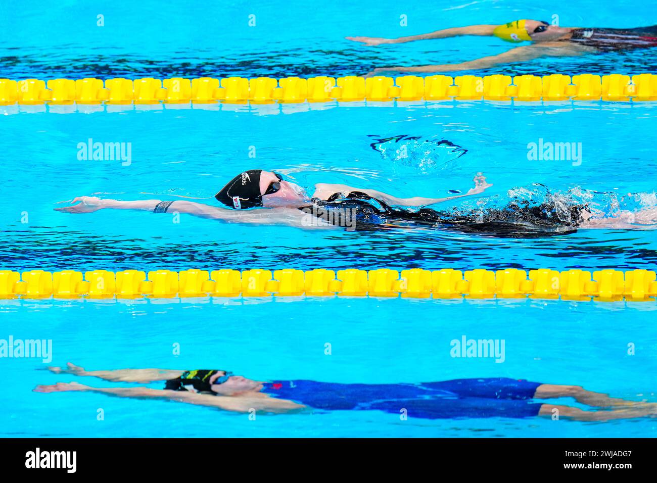 Iona Anderson of Australia, top, Ingrid Wilm of Canada, center, and ...